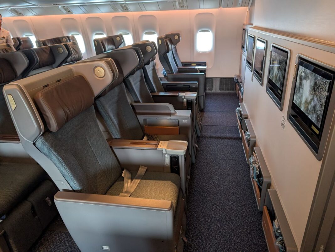 Review: Cathay Pacific B777-300ER New Premium Economy Class (SIN-HKG ...